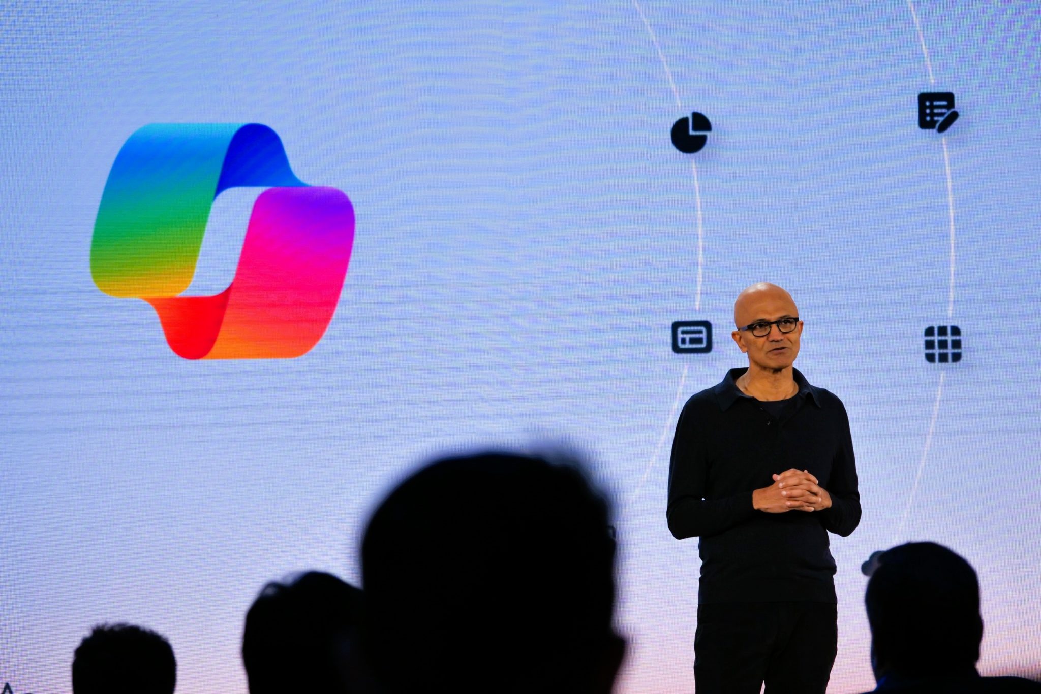 Microsoft CEO Predicts Surge in AI Adoption Driven by Increased ...